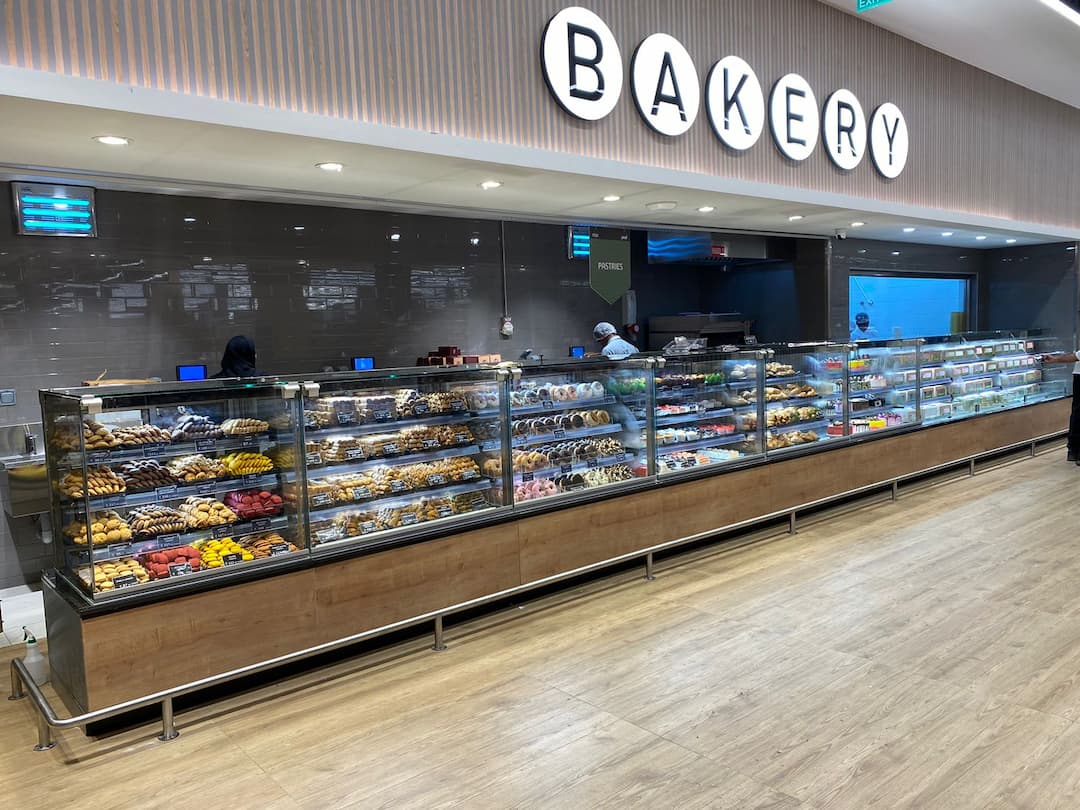 Showcase Your Creations with Counterline's Cake Display Cases - Counterline